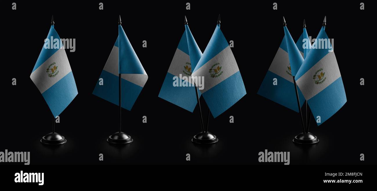 Small national flags of the Guatemala on a black background Stock Photo ...