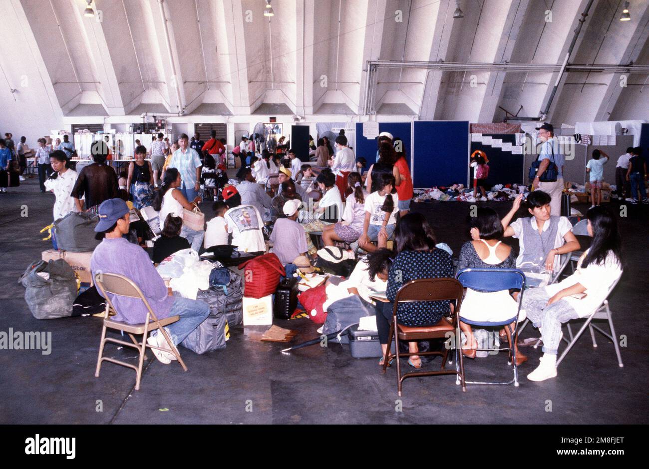 Some of the 20,000 military and civilian personnel being evacuated from ...