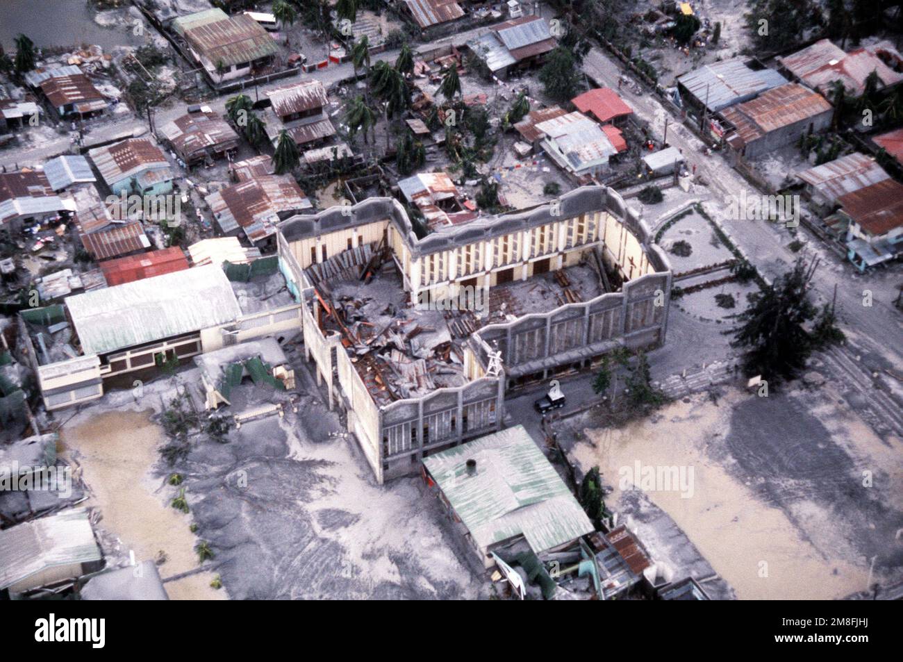 The roof of the Cubi Point chapel is collapsed from the weight of four ...