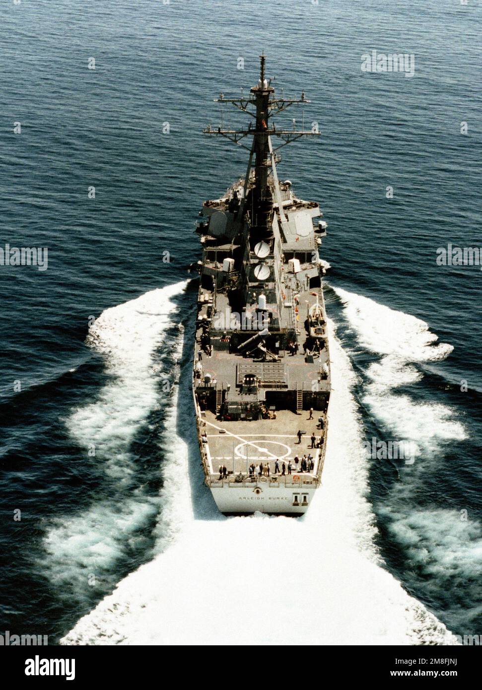A stern view of the guided missile destroyer ARLEIGH BURKE (DDG-51 ...