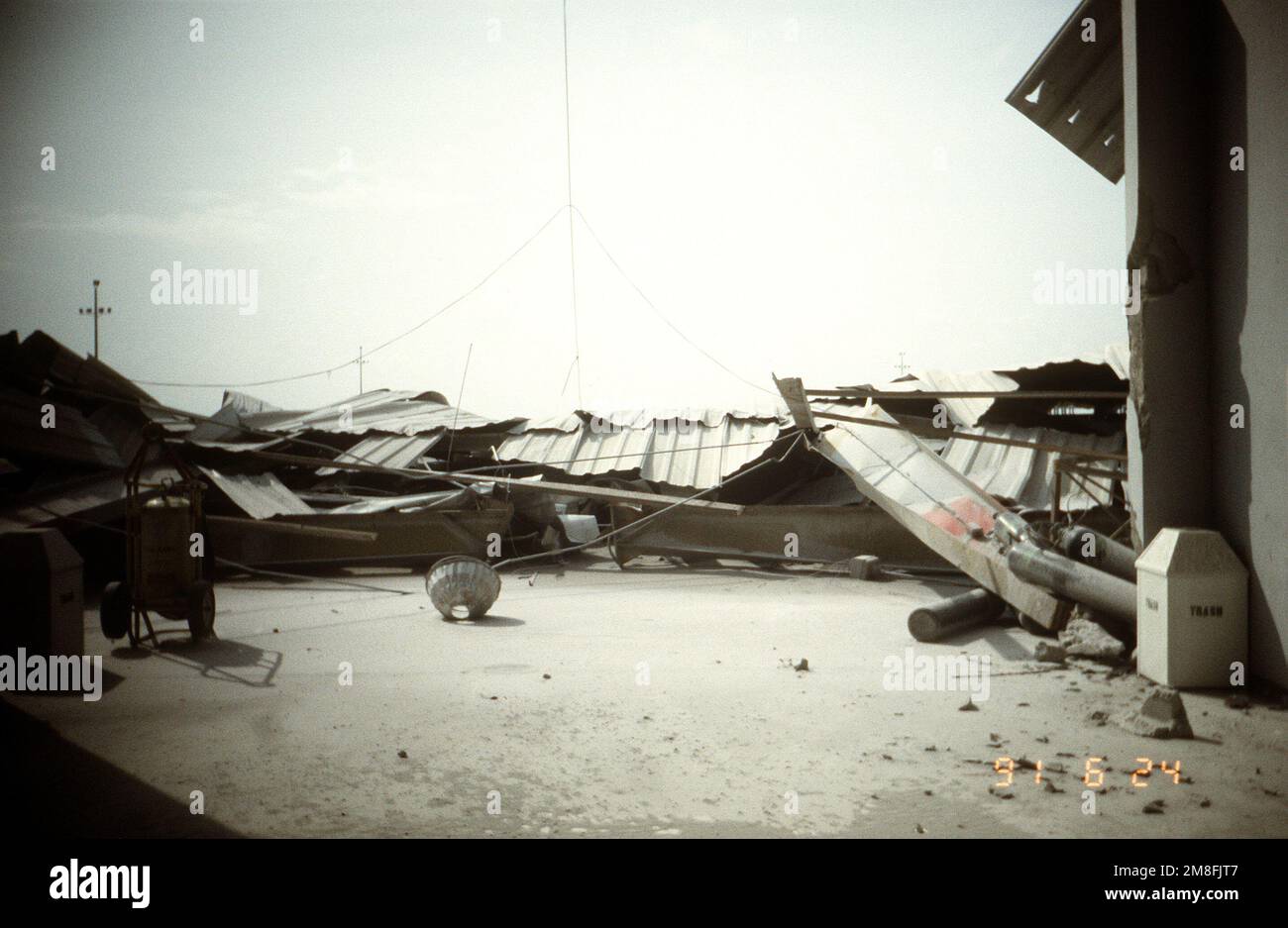 A view of a collapsed structure at the fuel systems maintenance dock ...