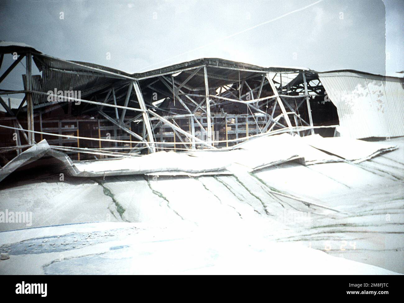 A view of a supply warehouse that collapsed under the weight of the ...
