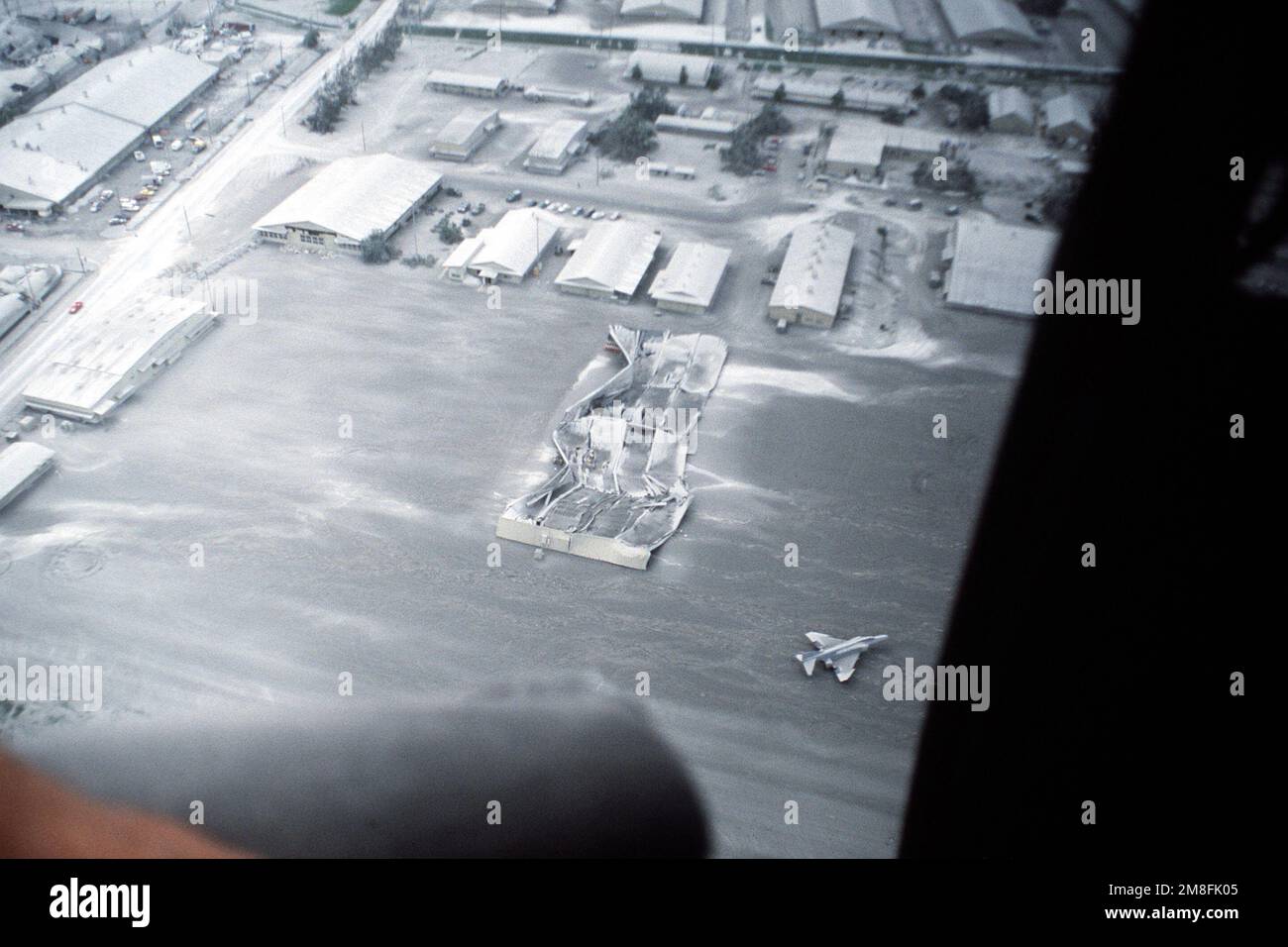 An aerial view of a portion of the base, showing an aircraft hangar ...