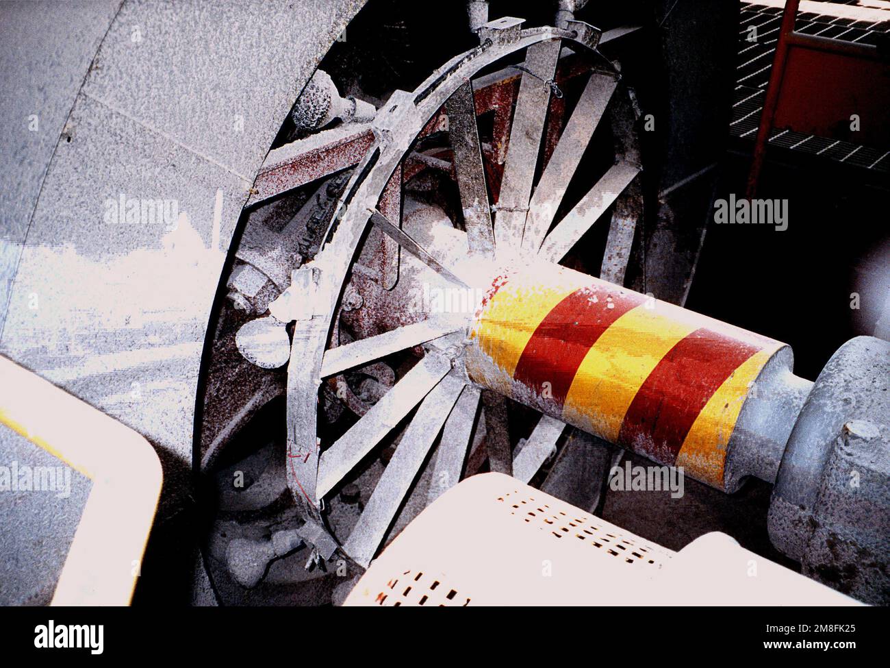 Volcanic ash covers an electrical generator in the base power plant. A ...