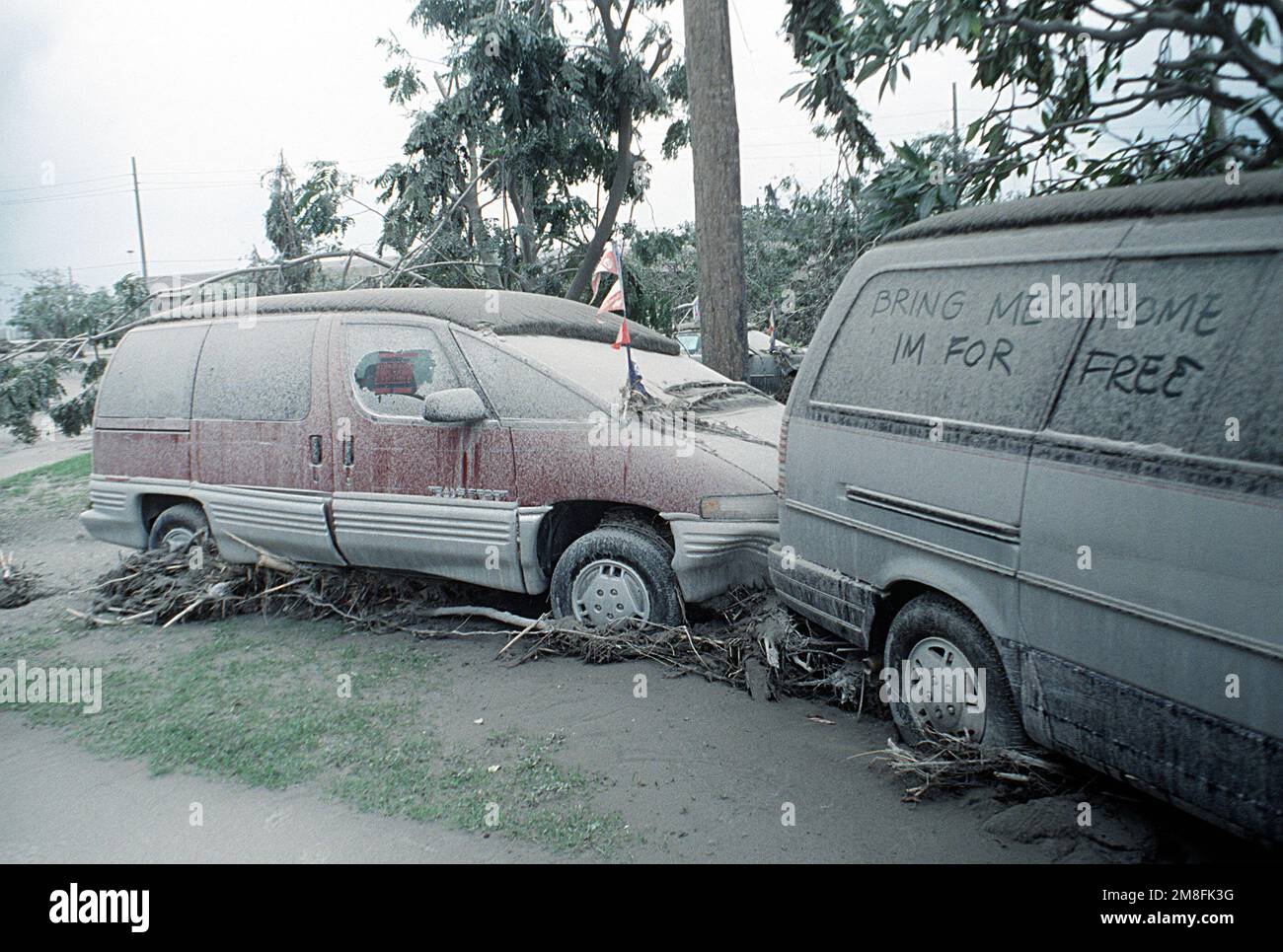 Volcanic ash covers two vehicles in the Army and Air Force Exchange ...