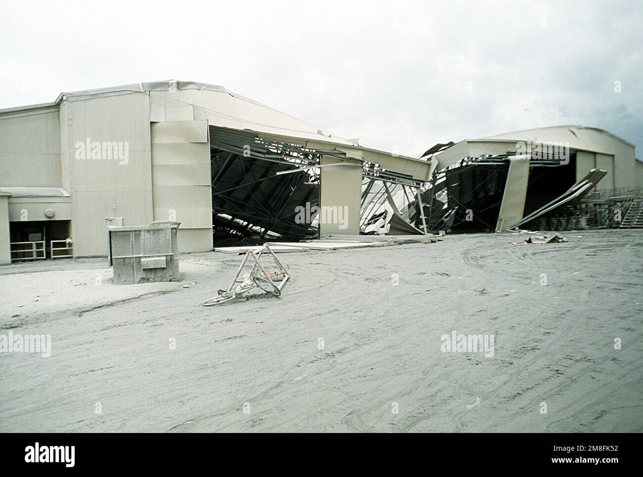 A view of an aircraft hangar that collapsed under the weight of the ...
