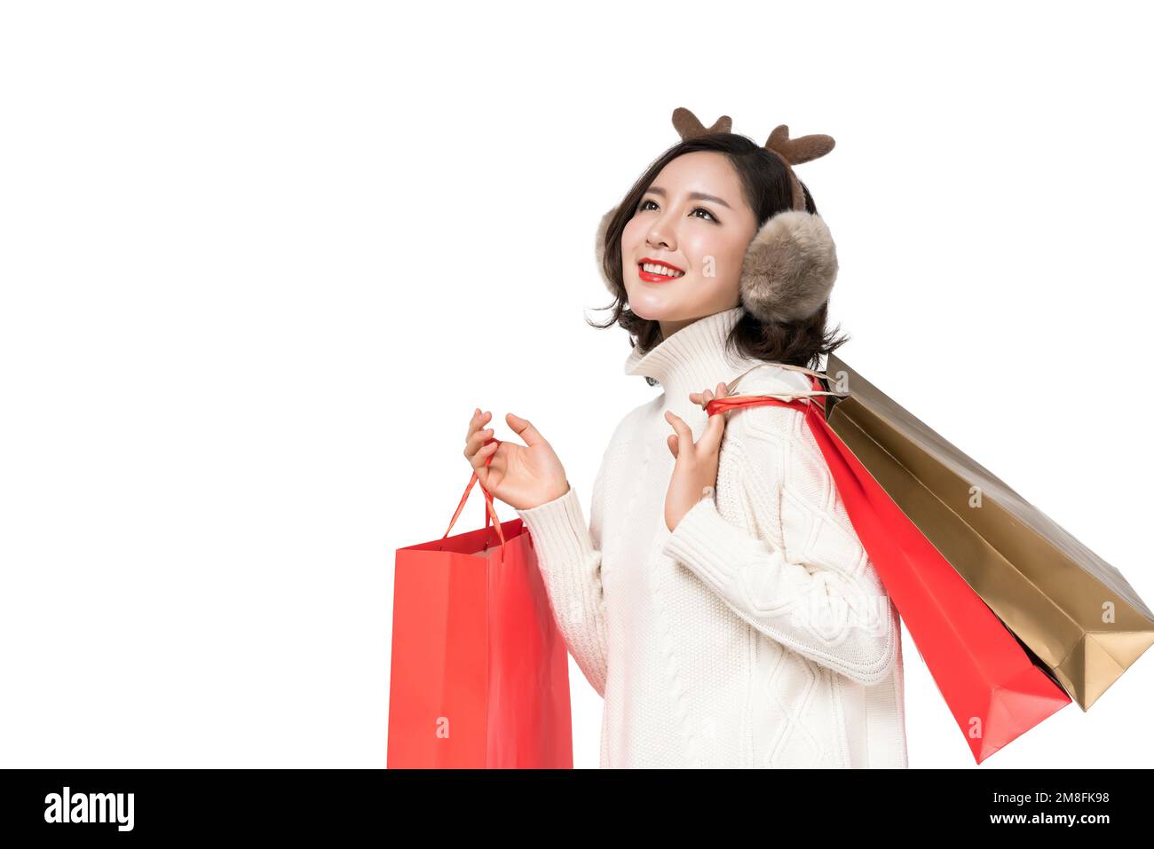 Woman in christmas shopping day Cut Out Stock Images & Pictures - Alamy