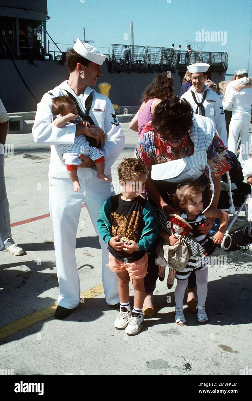 A petty officer from the tank landing ship USS FREDERICK (LST-1184) is ...