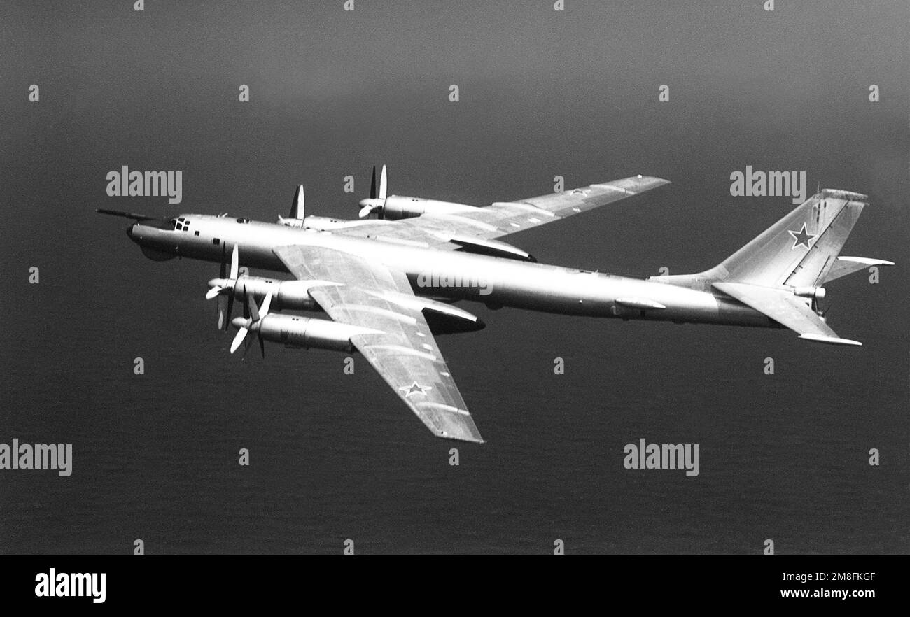 An air-to-air left side view of a Soviet naval air force Tu-95 Bear D ...
