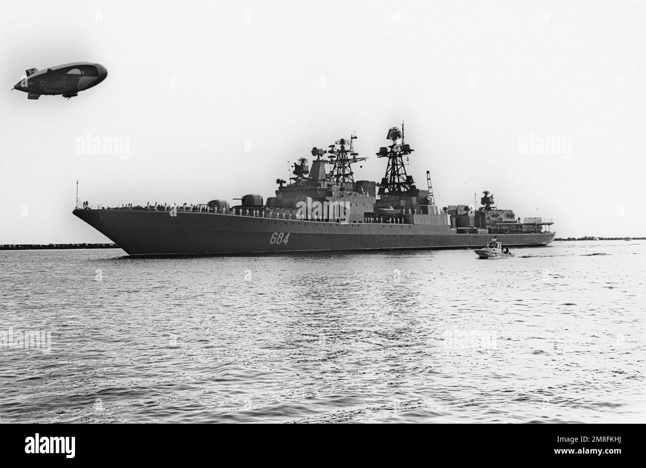 The Sea World airship flies overhead in welcome as the Soviet Udaloy ...