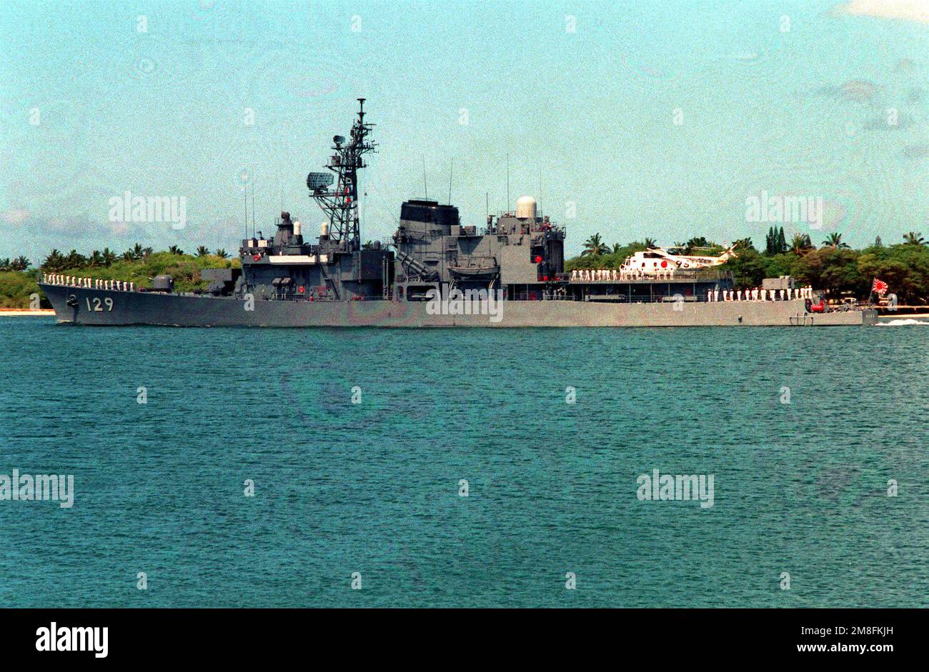 A port beam view of the Japanese Maritime Self-Defense Force (JMSDF ...