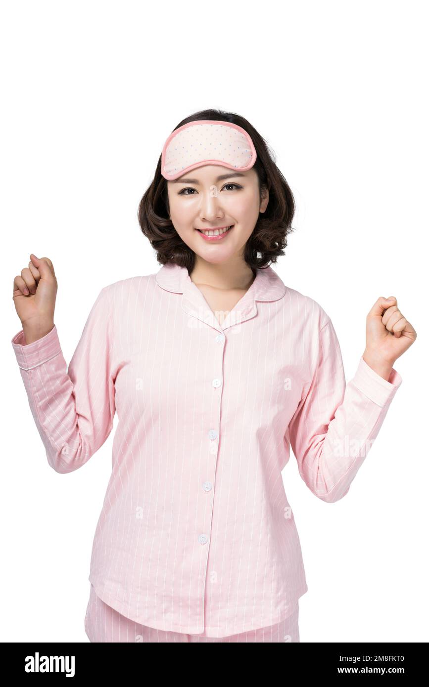 Woman wearing pink pyjamas hi-res stock photography and images - Alamy