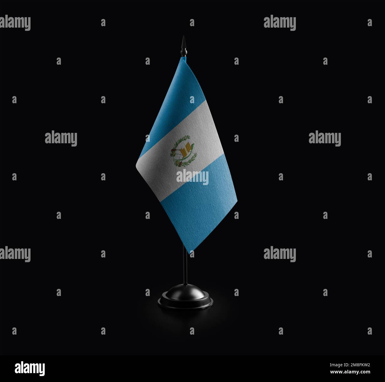 Small national flag of the Guatemala on a black background Stock Photo ...