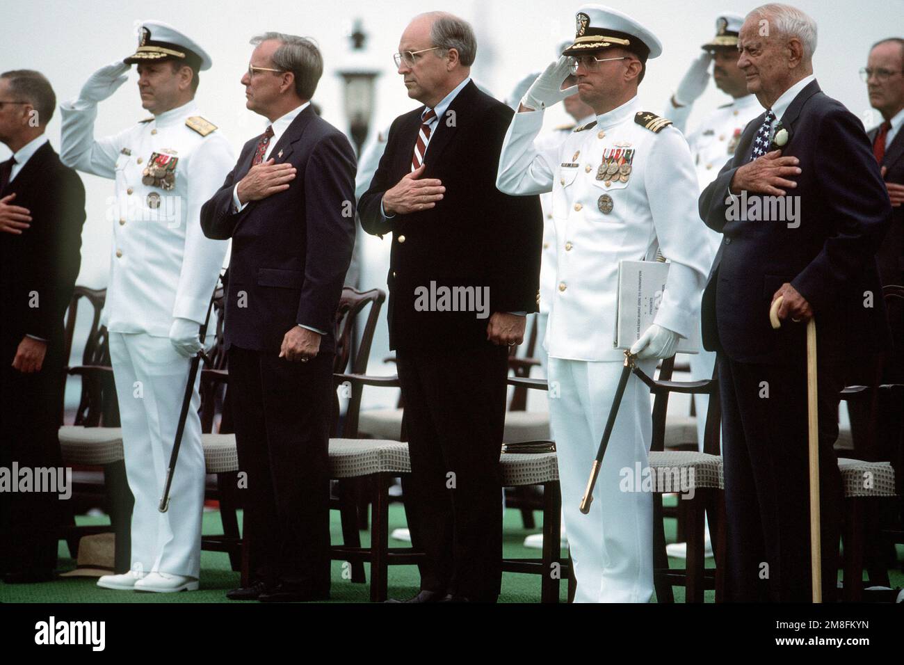 Honoring the flag during the commissioning ceremony for the guided ...