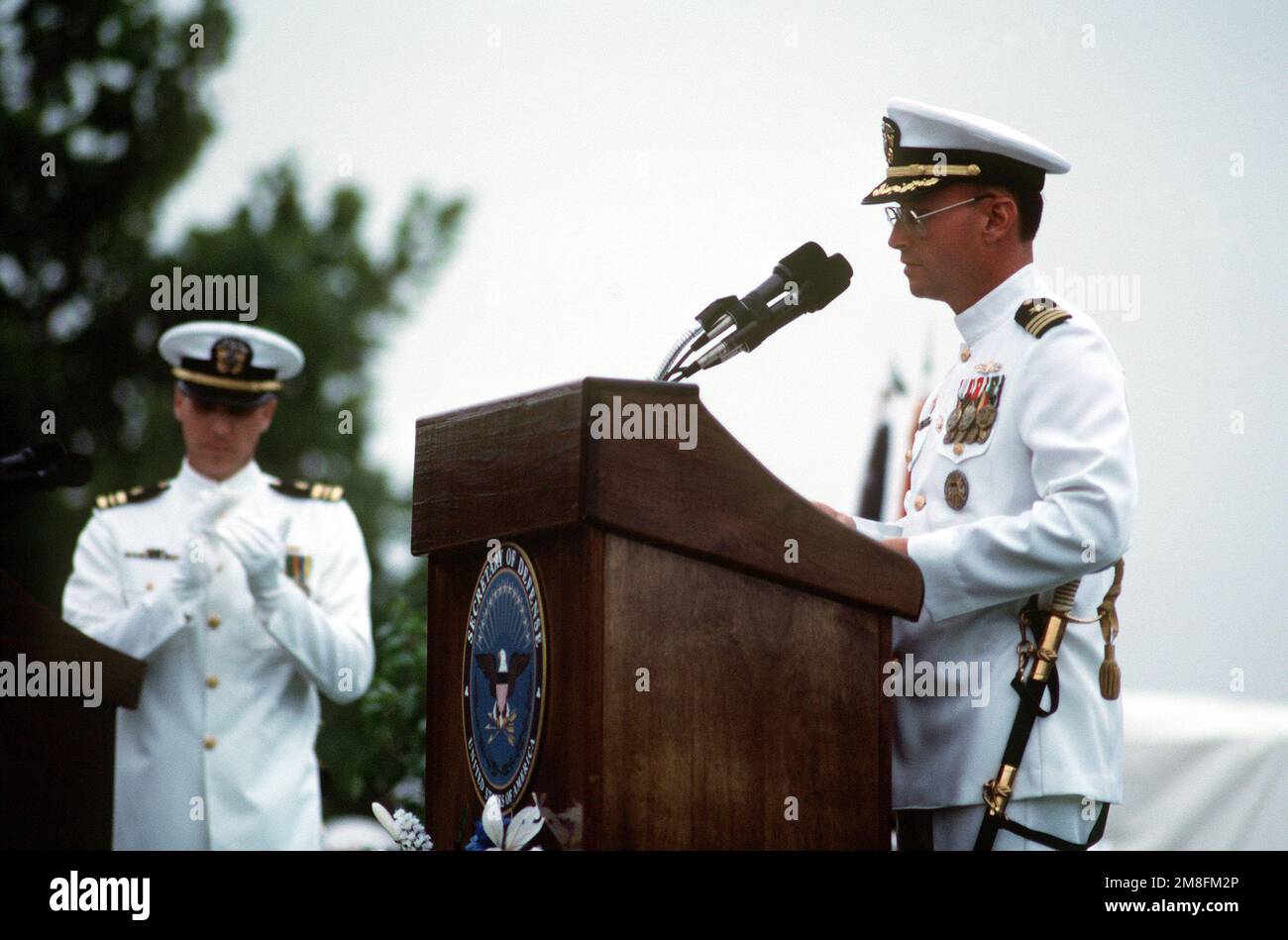 CMDR John G. Morgan speaks during the commissioning of the guided ...