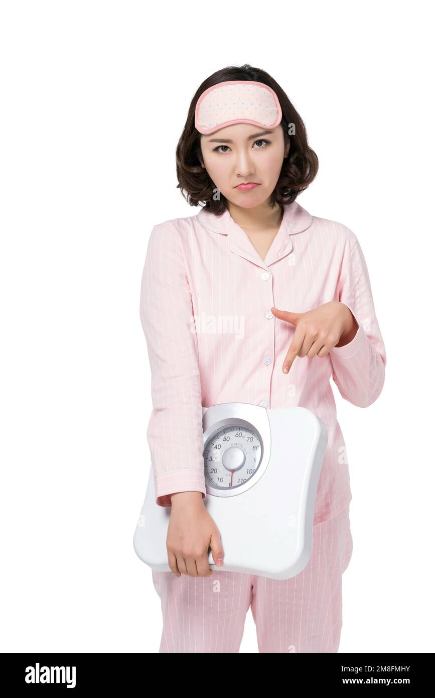 Man standing holding scales hi-res stock photography and images - Alamy