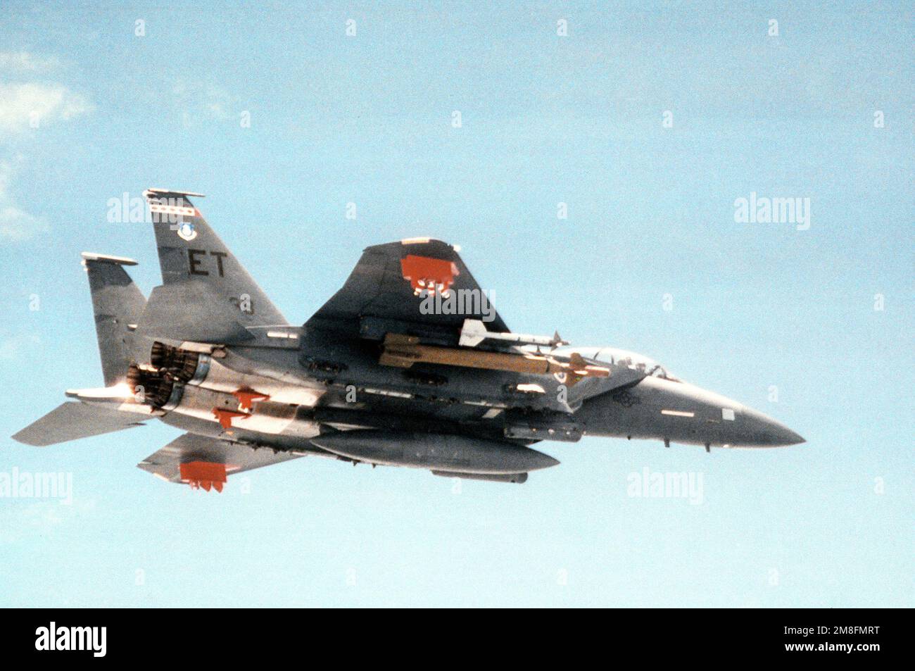 Air to air view of GBU-28 hard target guided bomb on an F-15E Eagle ...
