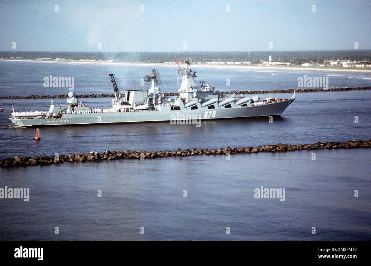 The Soviet Slava class guided missile cruiser MARSHAL USTINOV steams ...