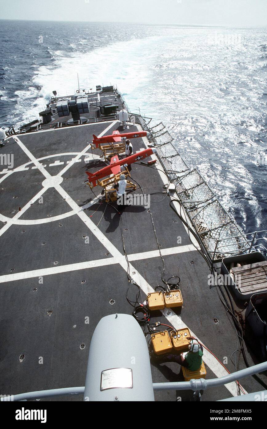 Personnel from Fleet Composite Squadron 6 (VC-6) conduct a pre-launch ...