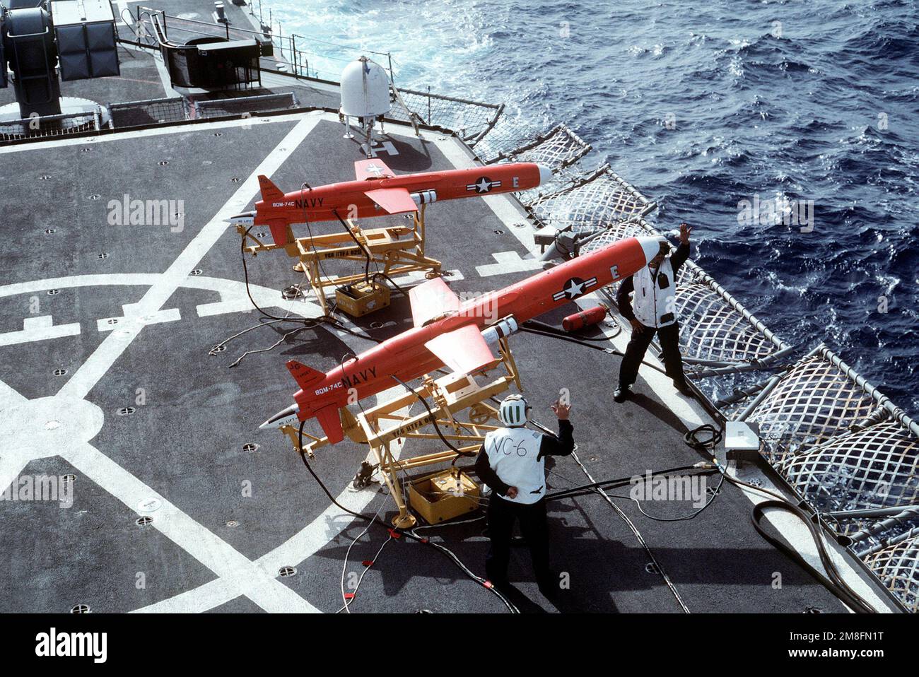 Personnel from Fleet Composite Squadron 6 (VC -6) run pre-launch tests ...