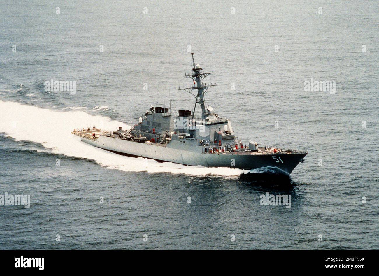 A starboard bow view of the guided missile destroyer USS ARLEIGH BURKE ...