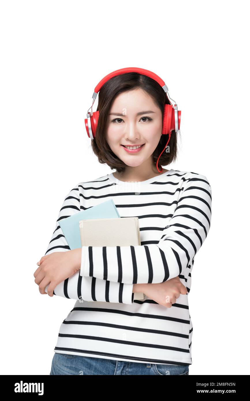 Woman wearing headphones carrying hi-res stock photography and images ...