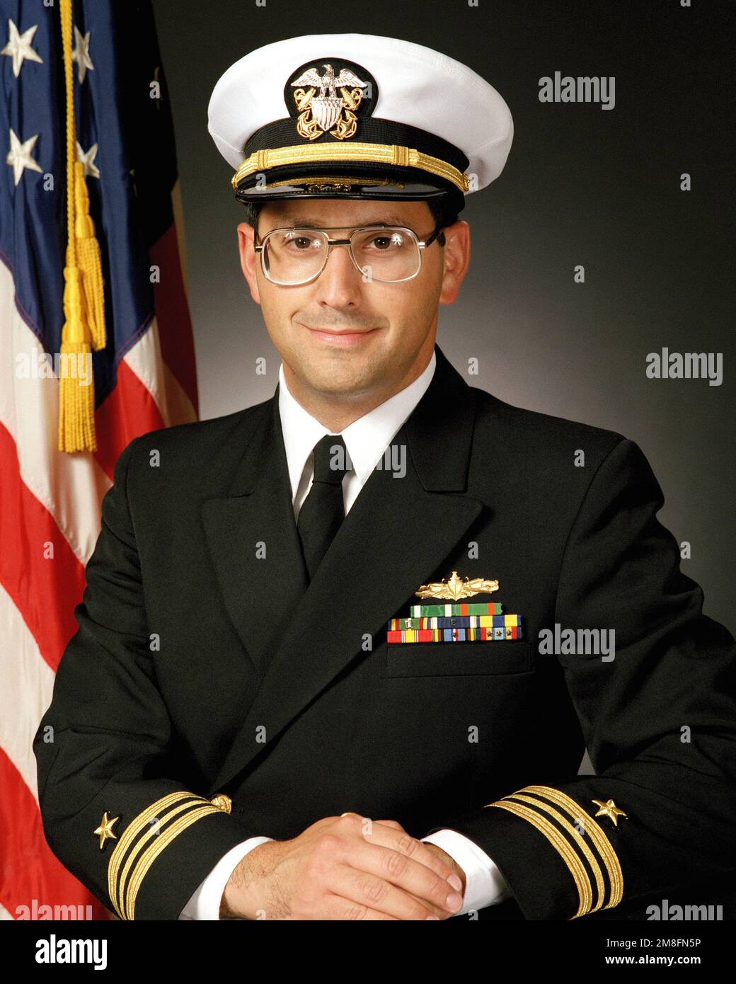 Lieutenant Commander Vincent A. Squitieri, USN (covered). Country ...