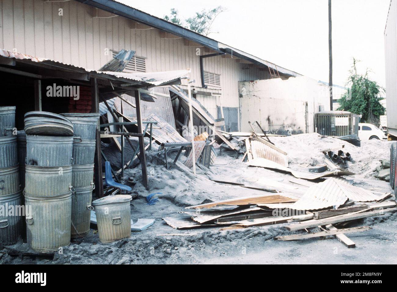 An exterior view of the damage caused to Public Works Center building ...