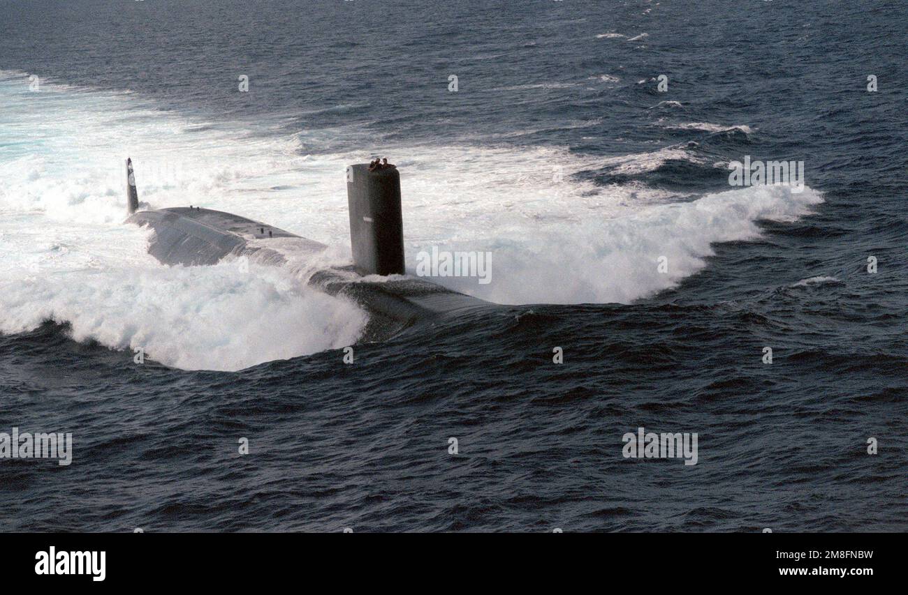 A starboard bow view of the nuclear-powered attack submarine USS ...