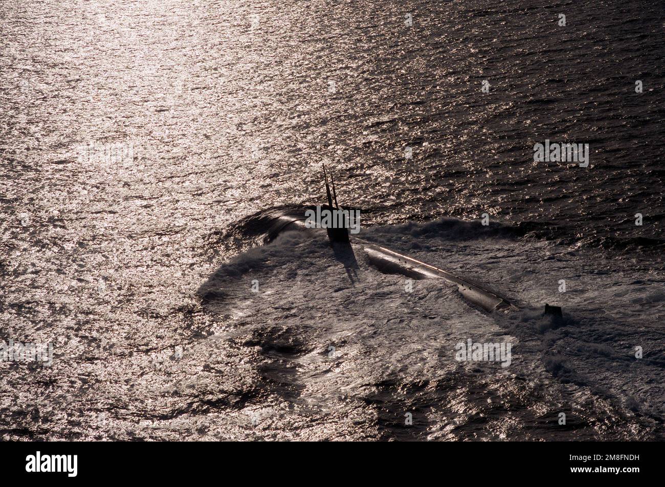 A port quarter view of the nuclear-powered attack submarine USS ...