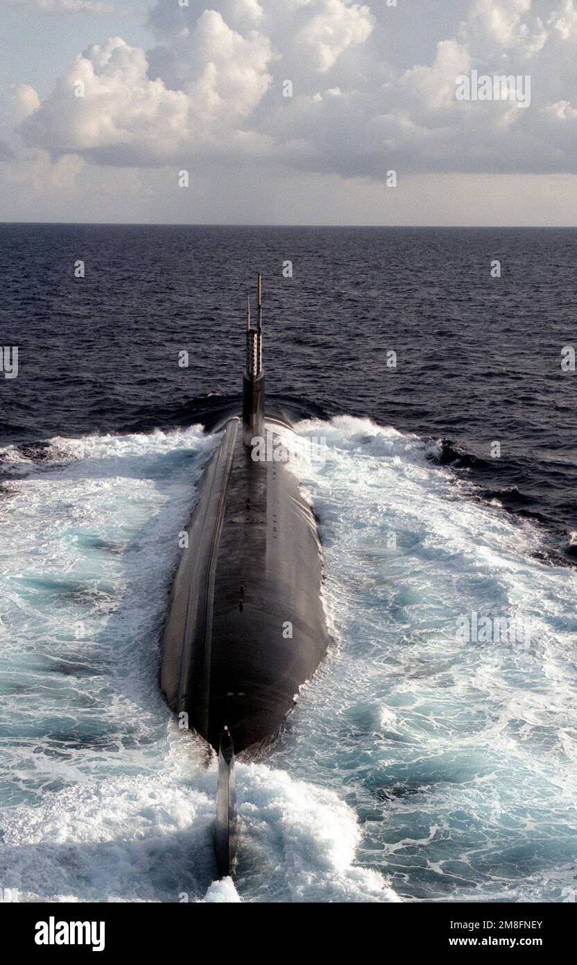 A stern view of the nuclear-powered attack submarine USS ALEXANDRIA ...