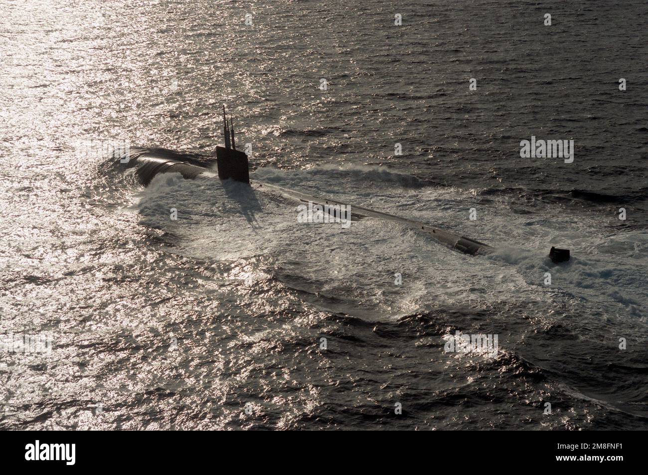 A port quarter view of the nuclear-powered attack submarine USS ...