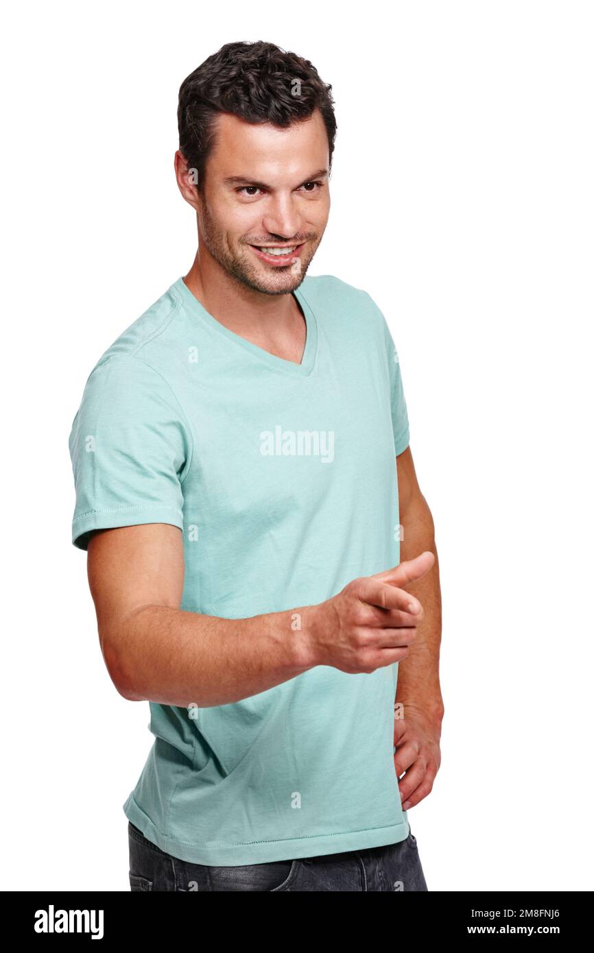 Handsome man, smile and pointing finger while standing against a white ...