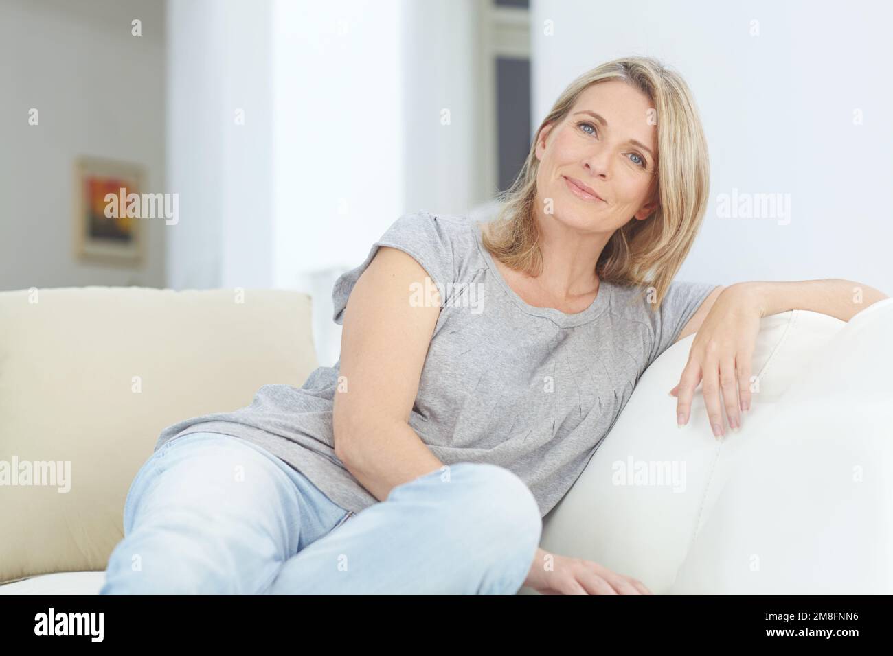 Mature woman in comfortable home hi-res stock photography and images ...