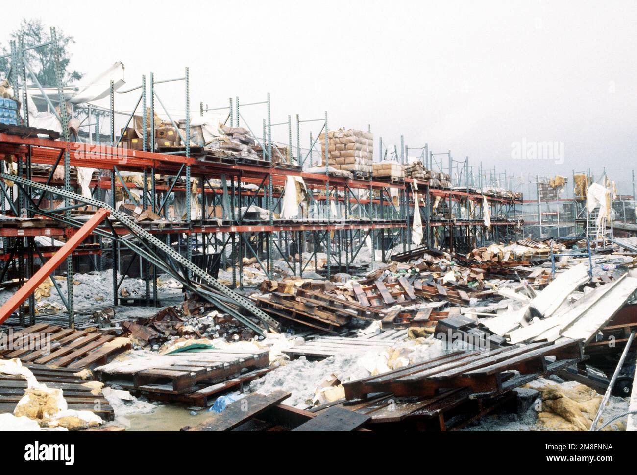 A view of the rubble of the Navy Exchange's beverage warehouse. The ...