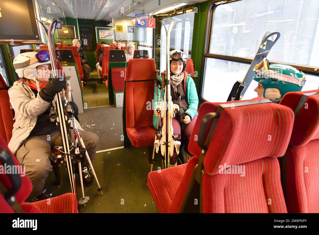 Geneva. 12th Jan, 2023. Skiers take a train down the Jungfrau Mountain ...