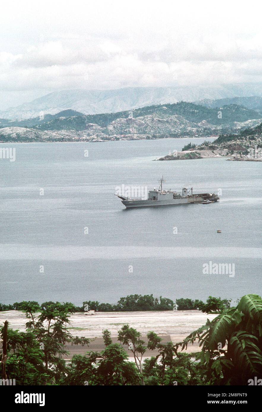 The tank landing ship USS PEORIA (LST-1183) waits off Cubi Point upon ...
