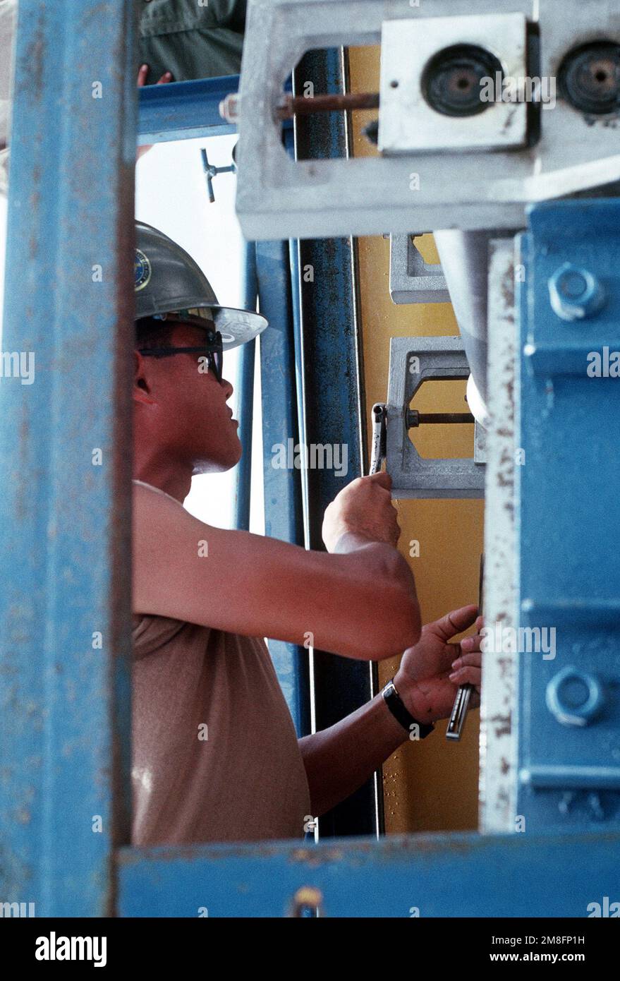 Steelworker Constructionman Dickerson, a Seabee with Naval Mobile ...