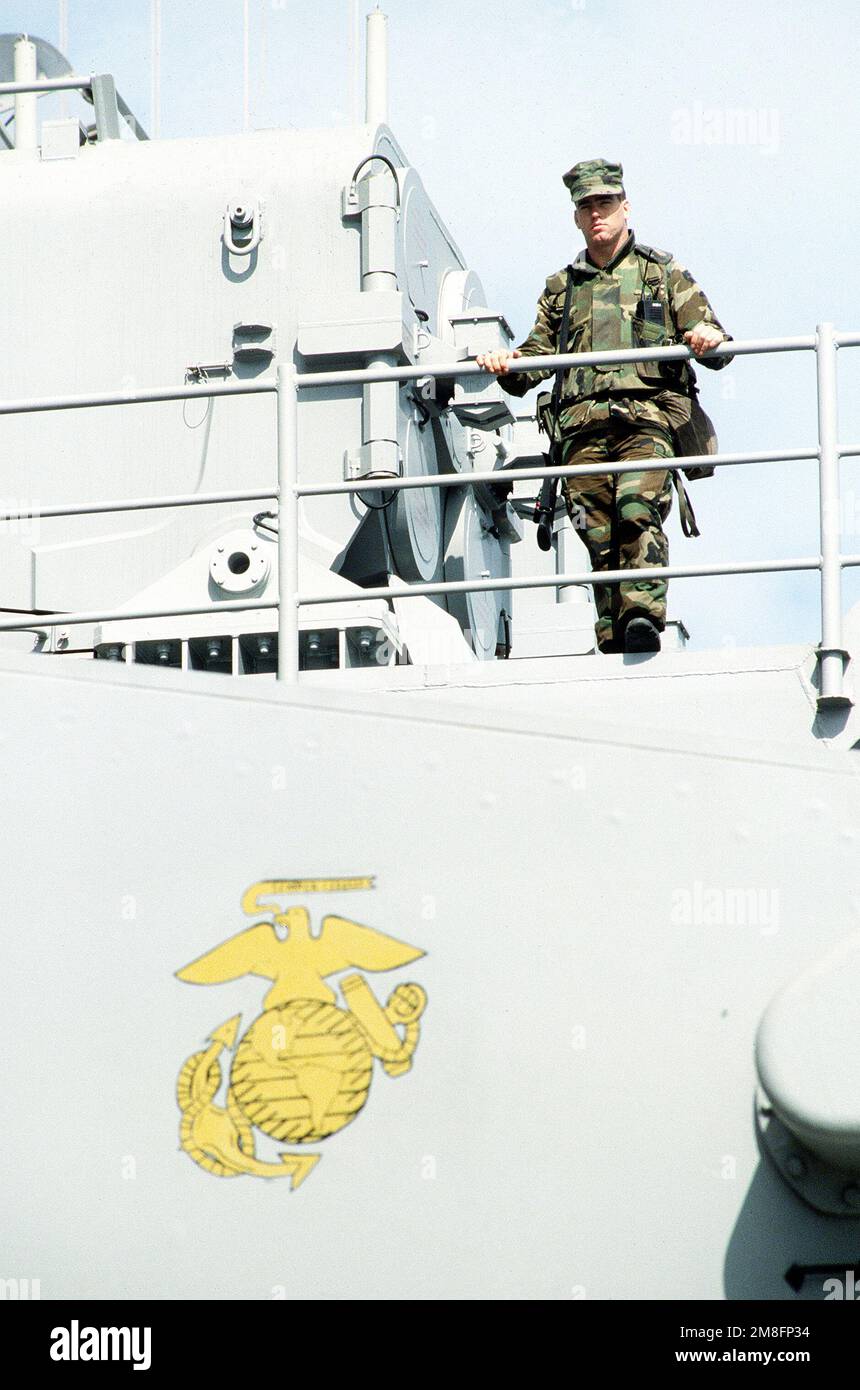 Lance CPL. Joe Manning of the ship's Marine detachment pauses near a ...