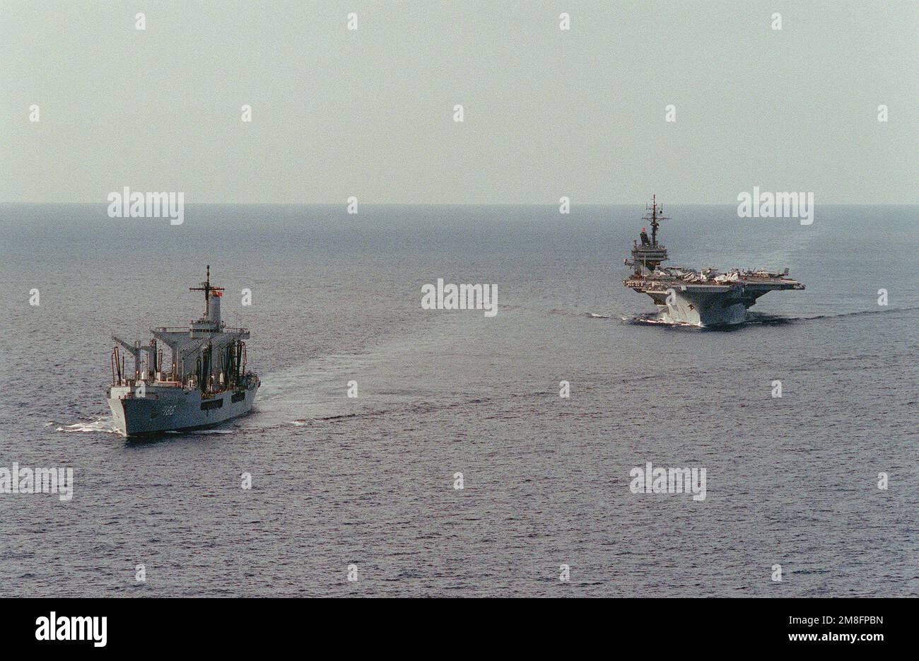 The fleet oiler USS PLATTE (AO-186) steams ahead of the aircraft ...