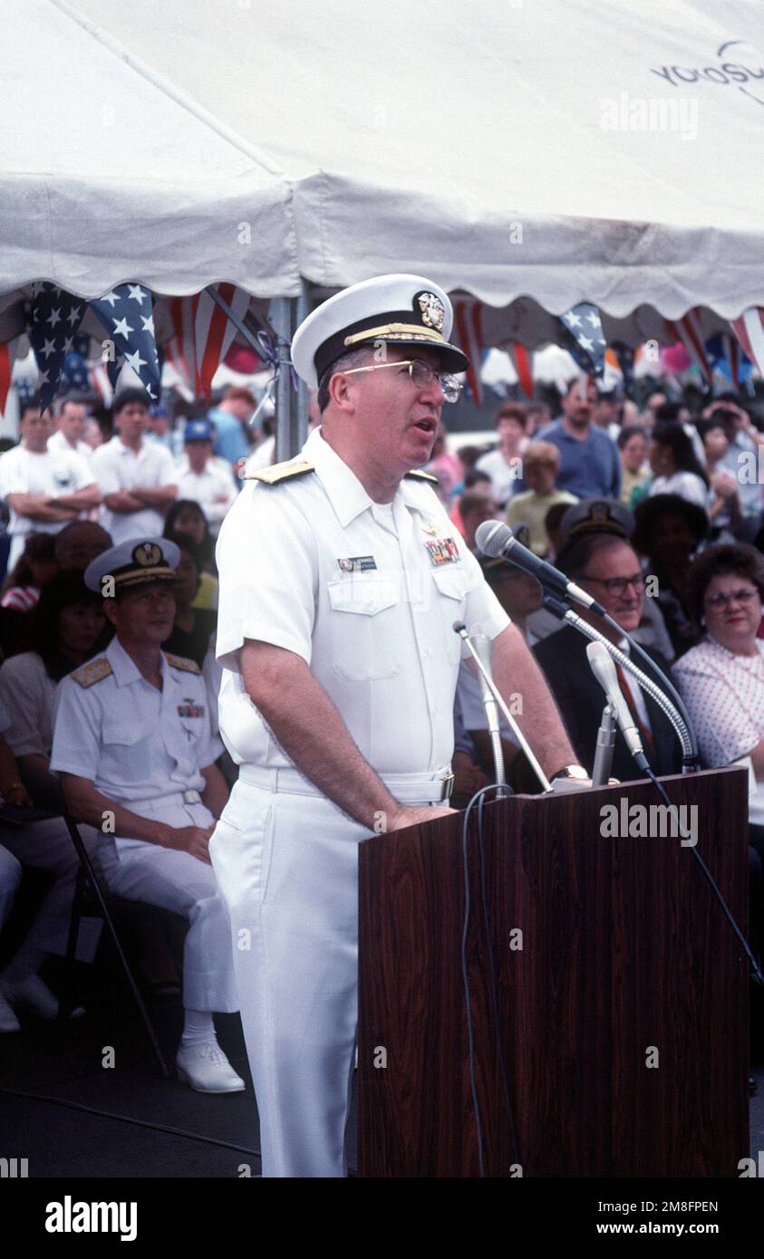 RADM Jesse J. Hernandez, commander, U.S. Naval Forces Japan, speaks ...