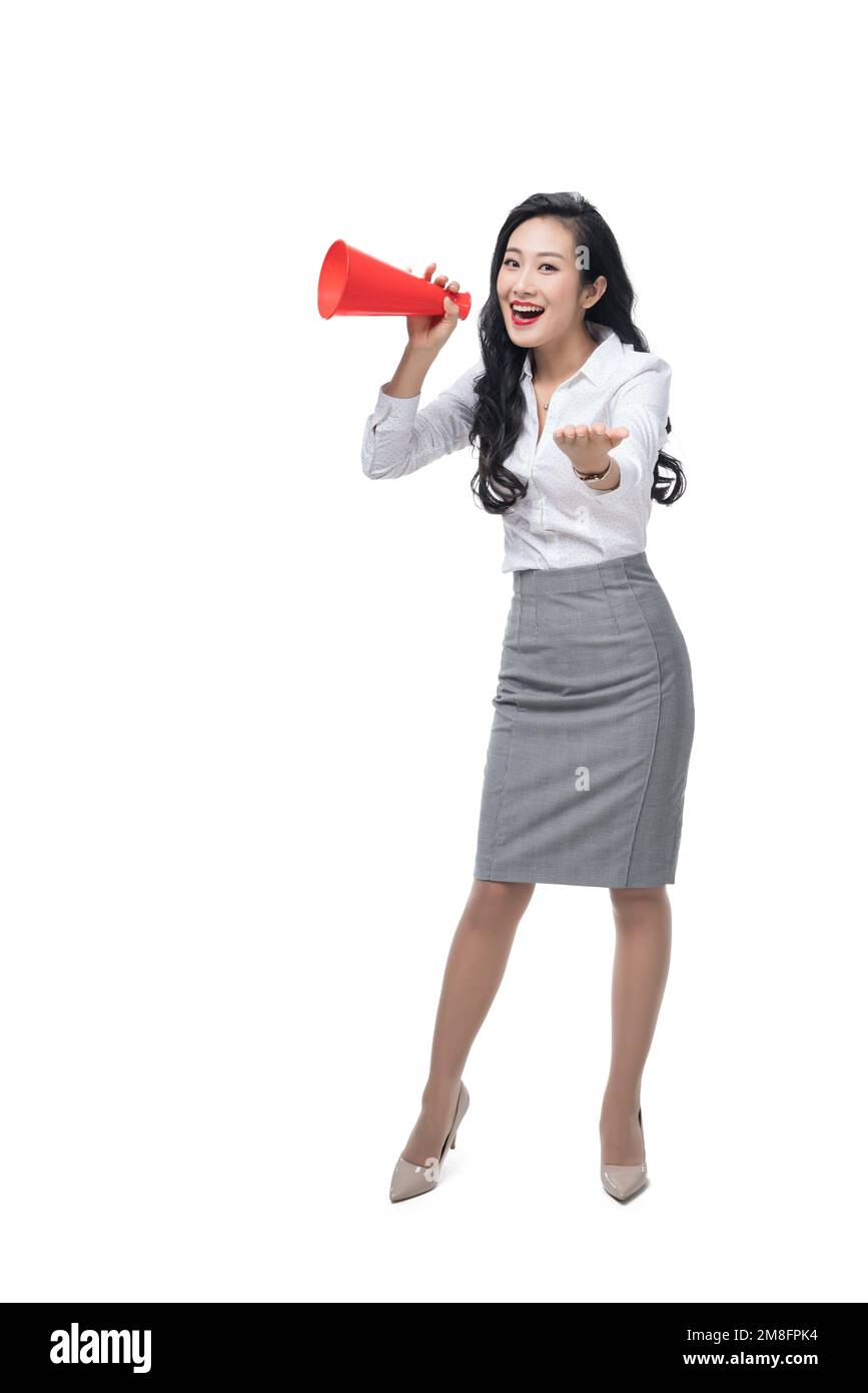 Young business woman holding a microphone Stock Photo - Alamy