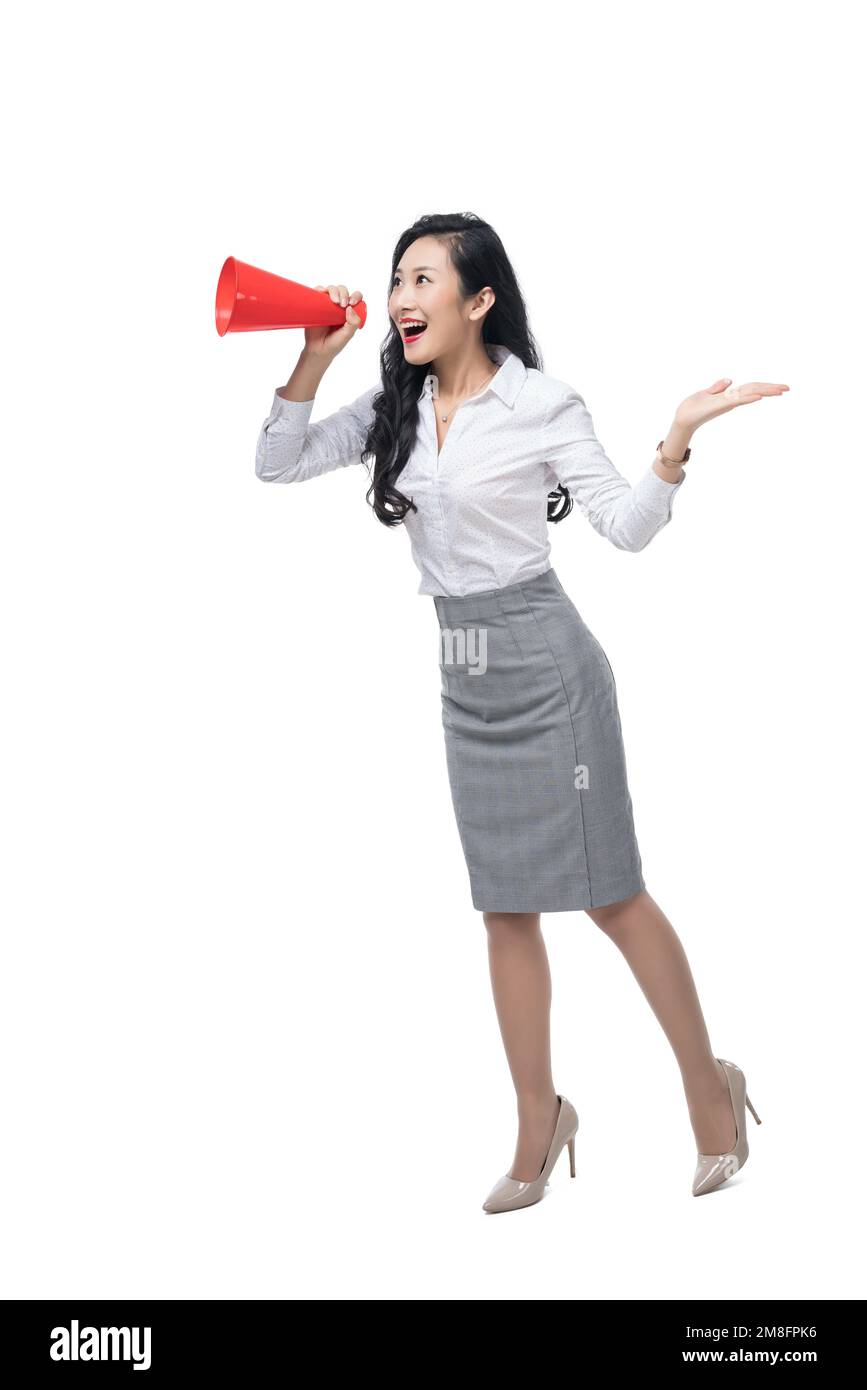 Young business woman holding a microphone Stock Photo - Alamy