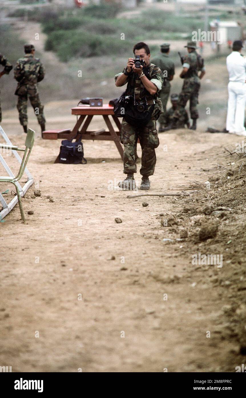 Photographer's Mate 2nd Class Johnny Bivera documents training between ...