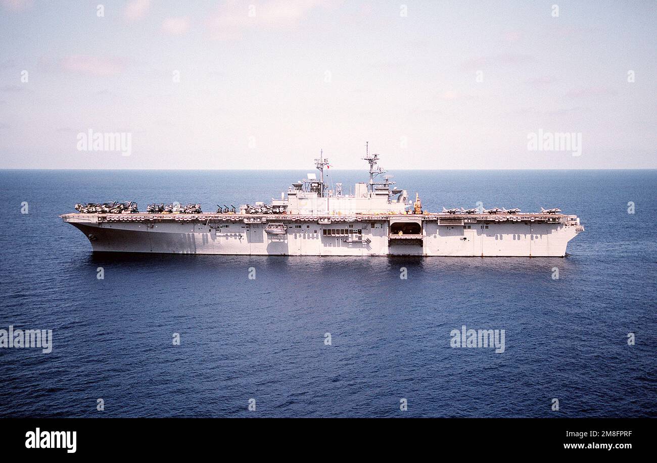 A port beam view of the amphibious assault ship USS WASP (LHD-1) as it ...