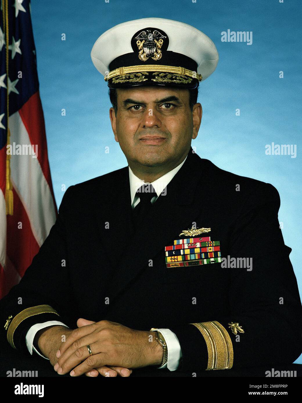 Rear Admiral (lower half) Ray R. Sareeram, USN (covered). Country ...