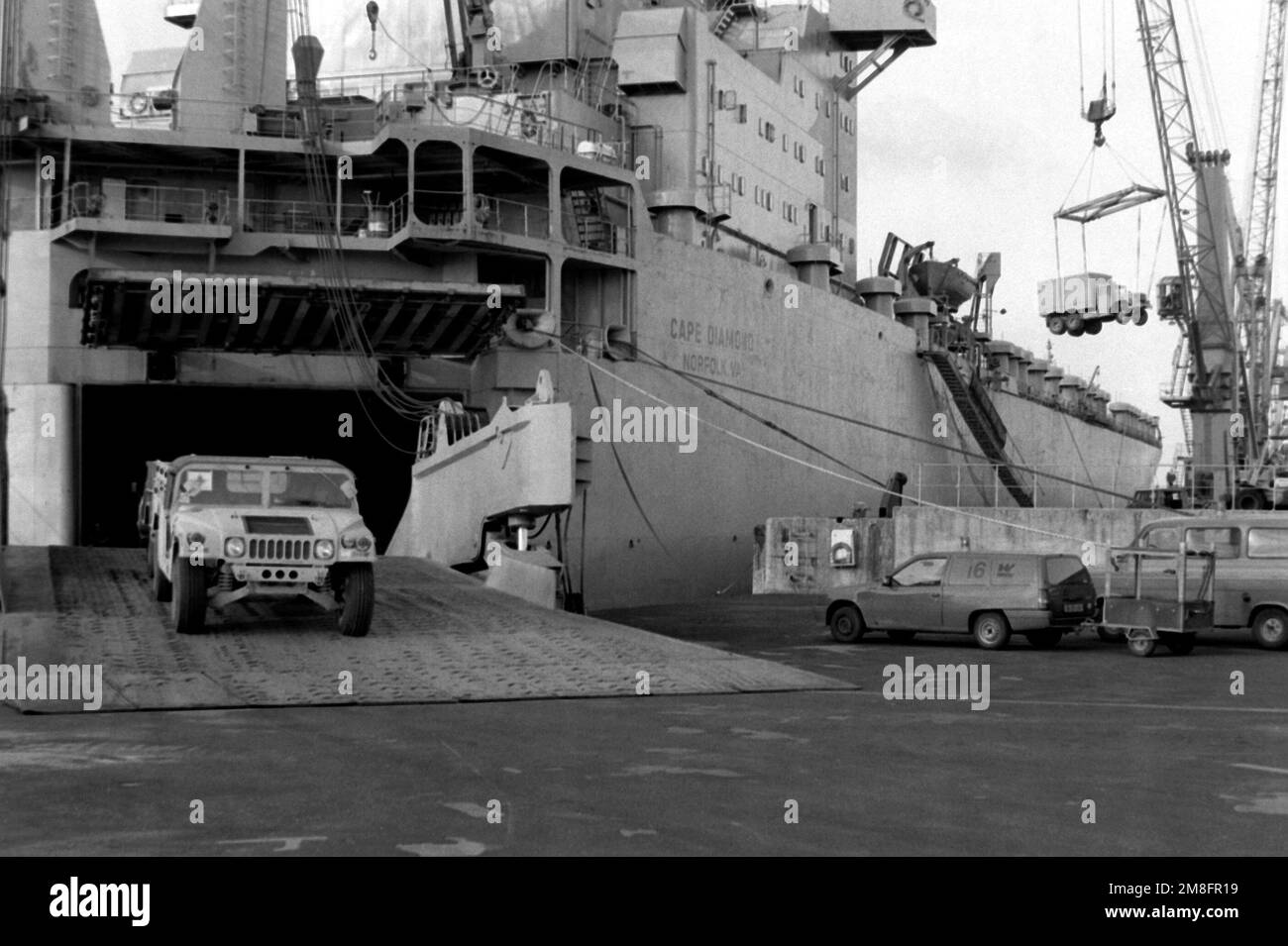 An M998 High-Mobility Multipurpose Wheeled Vehicle (HMMWV) is driven ...