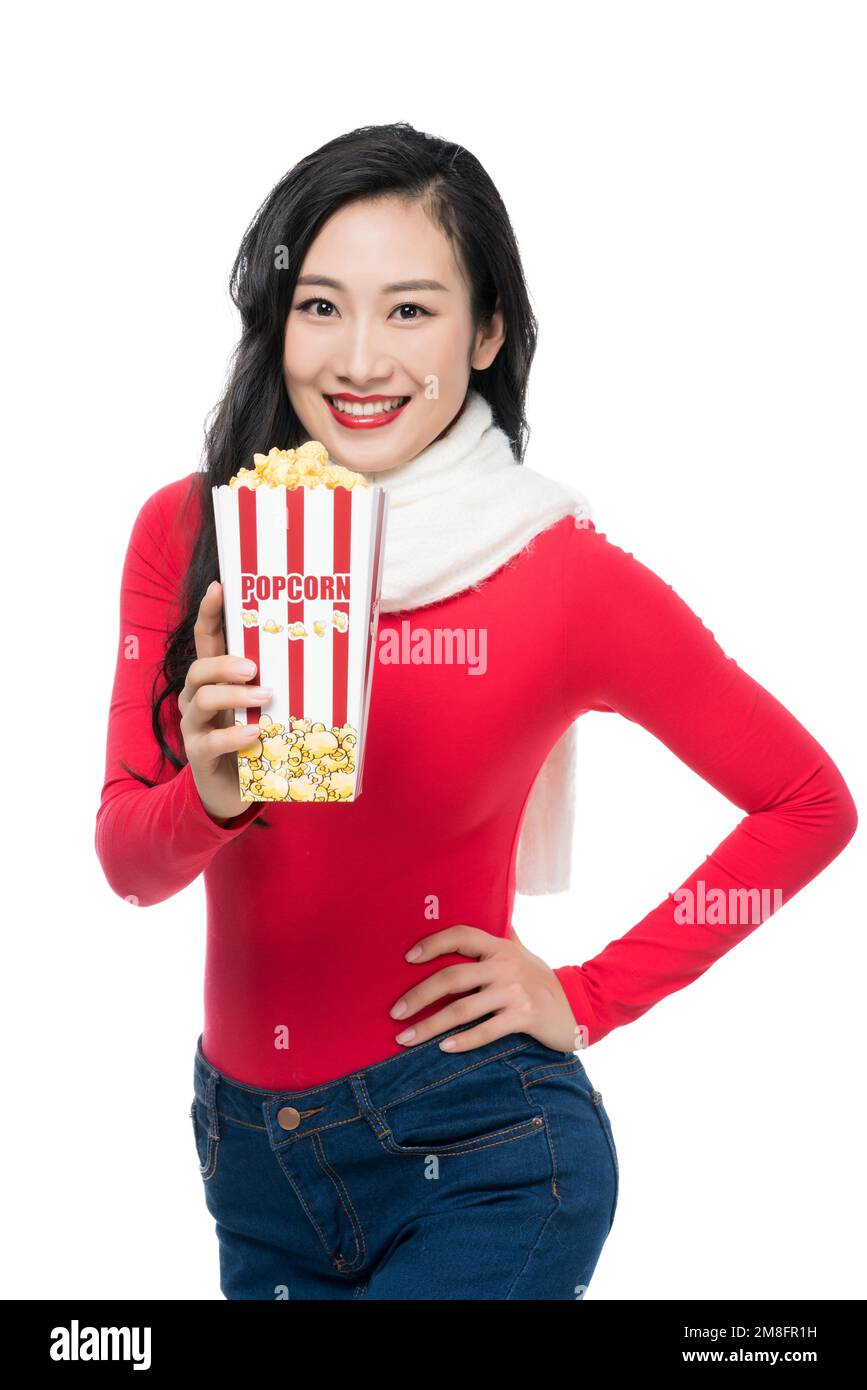 Woman popcorn standing hi-res stock photography and images - Alamy