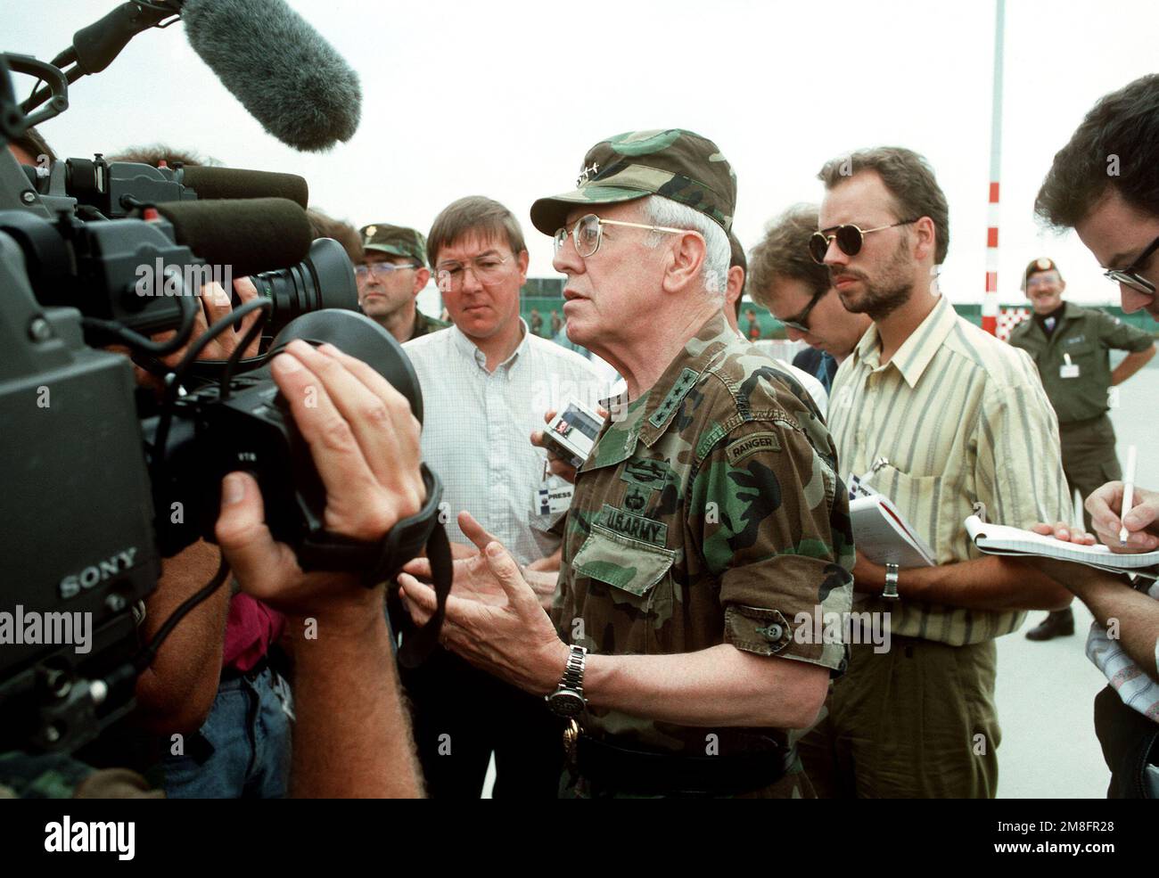 GEN John R. Galvin, supreme allied commander, Europe, speaks with the ...