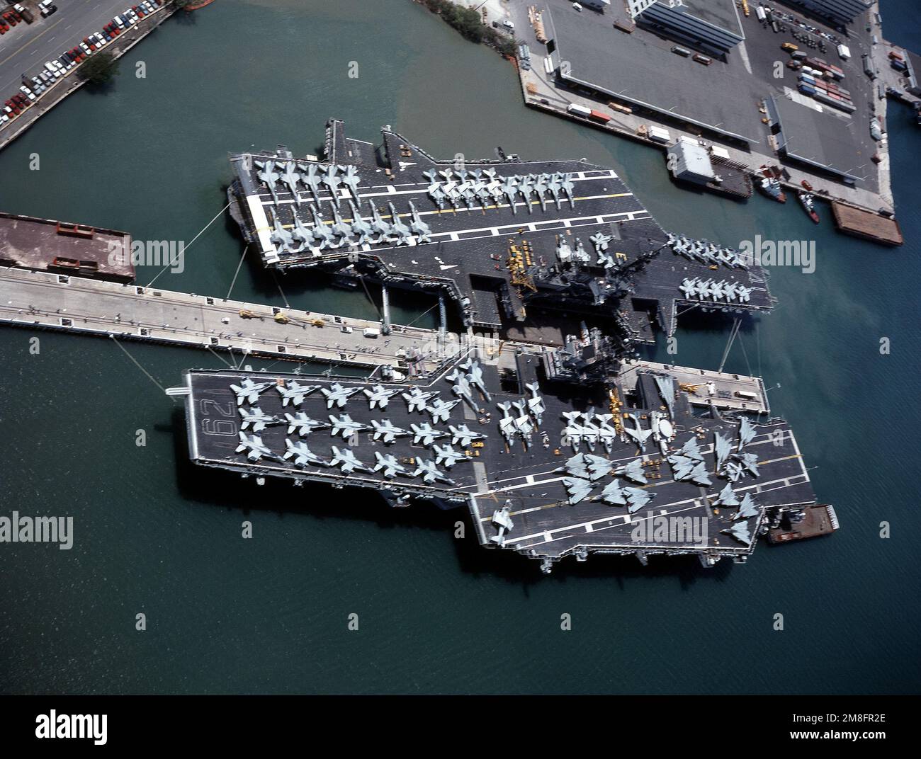 The aircraft carriers USS MIDWAY (CV-41), left and USS INDEPENDENCE (CV ...